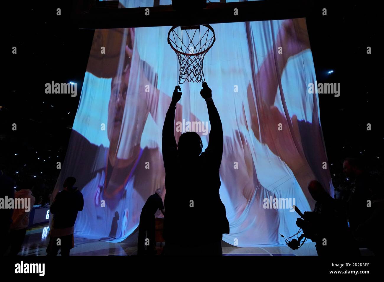 Los Angeles Lakers forward Troy Brown Jr. pulls down the net before ...