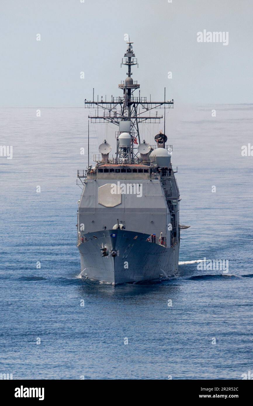 USS Normandy (CG 60), a Ticonderoga-class cruiser, steams in formation ...