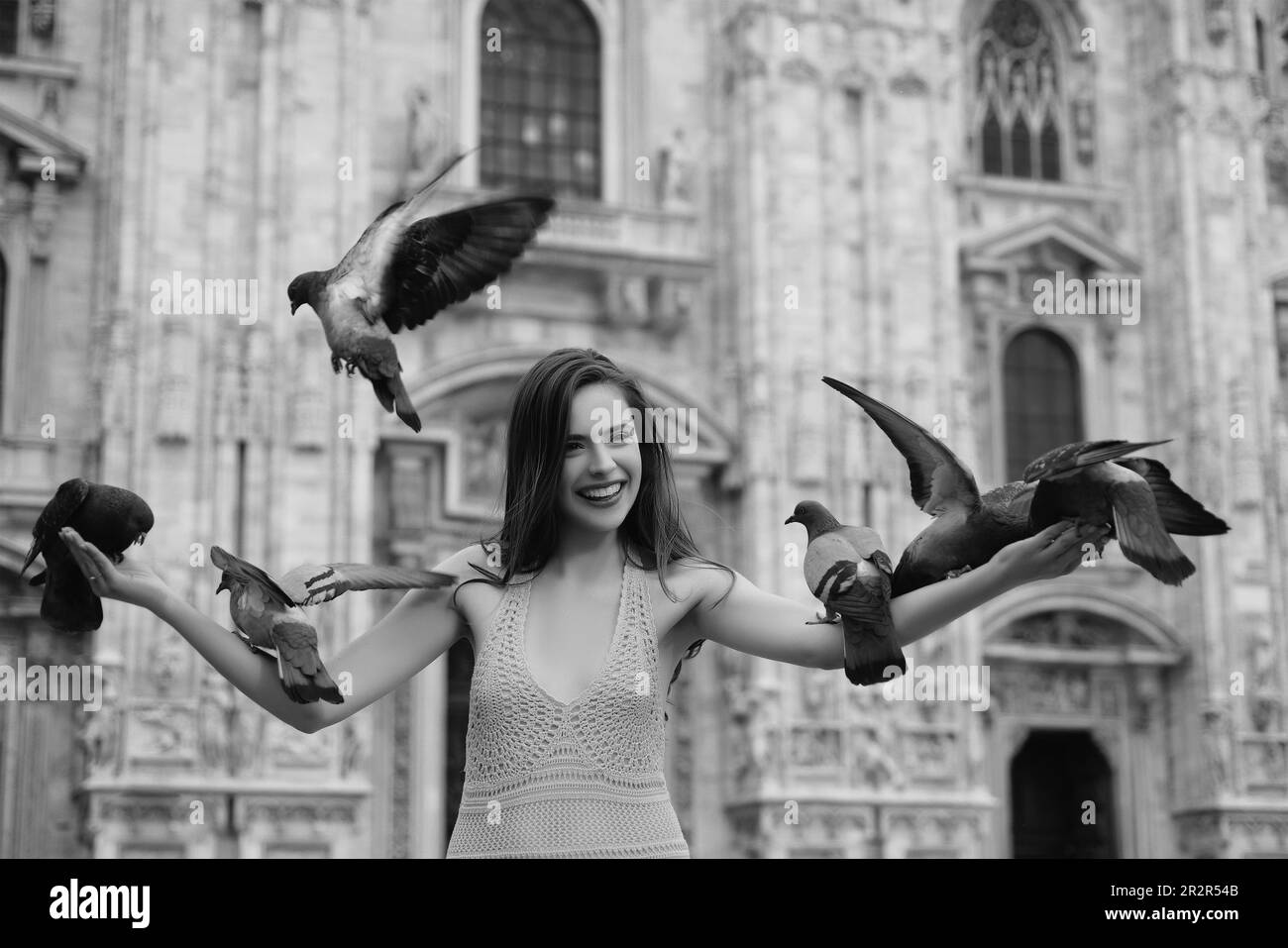 Young woman on Duomo di Milano Cathedral. Happy tourist in front of ...