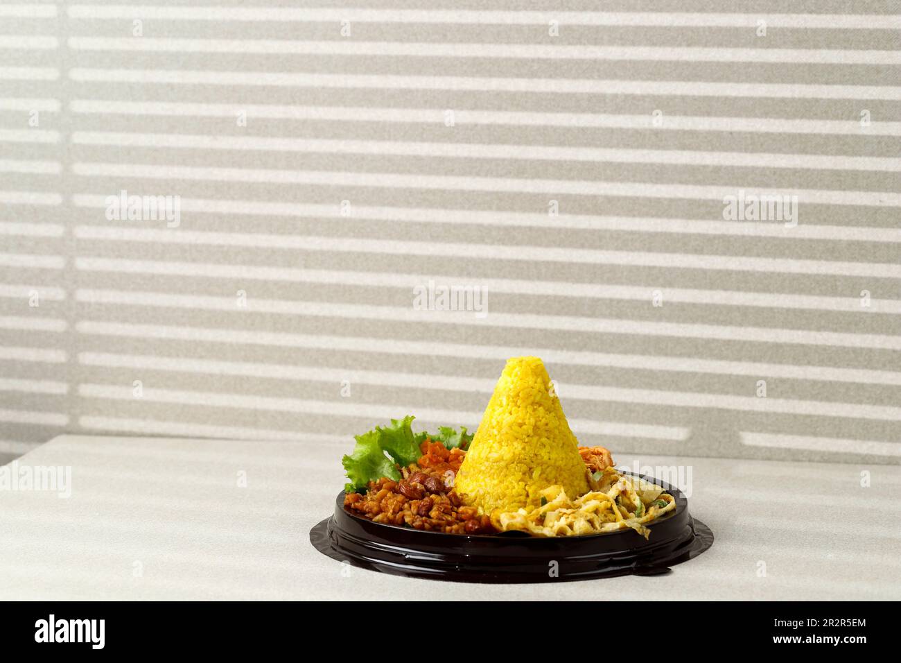 Tumpeng Mini Nasi Kuning or Small Cone Shaped Yellow Rice, Indonesian ...