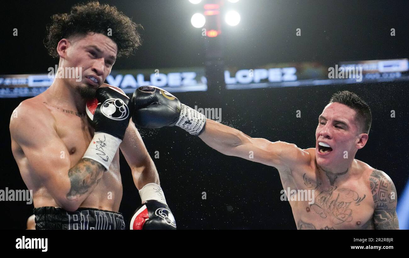 Adam Lopez, left, fights Oscar Valdez in a junior lightweight boxing match Saturday, May 20 ...