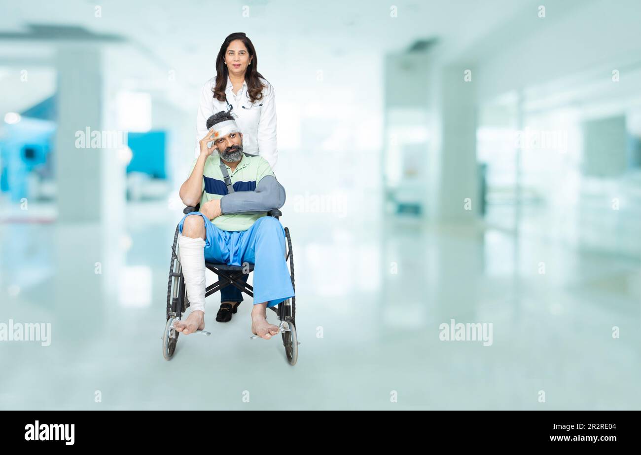 Young indian man with leg fractured after accident sitting on a ...