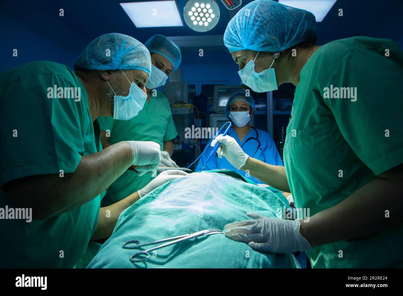 Asian female surgeon in operating room hi-res stock photography and ...