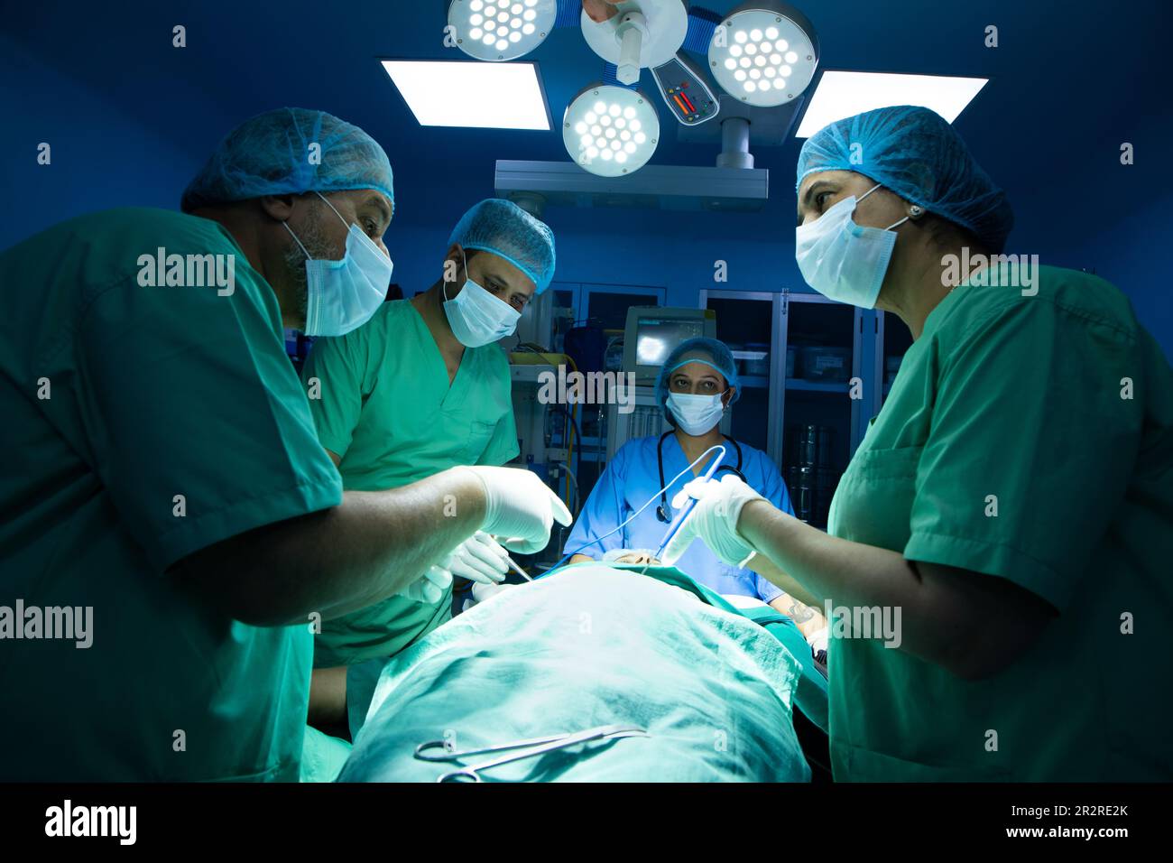 ndian surgeons medical team performing surgery in operation theater at ...