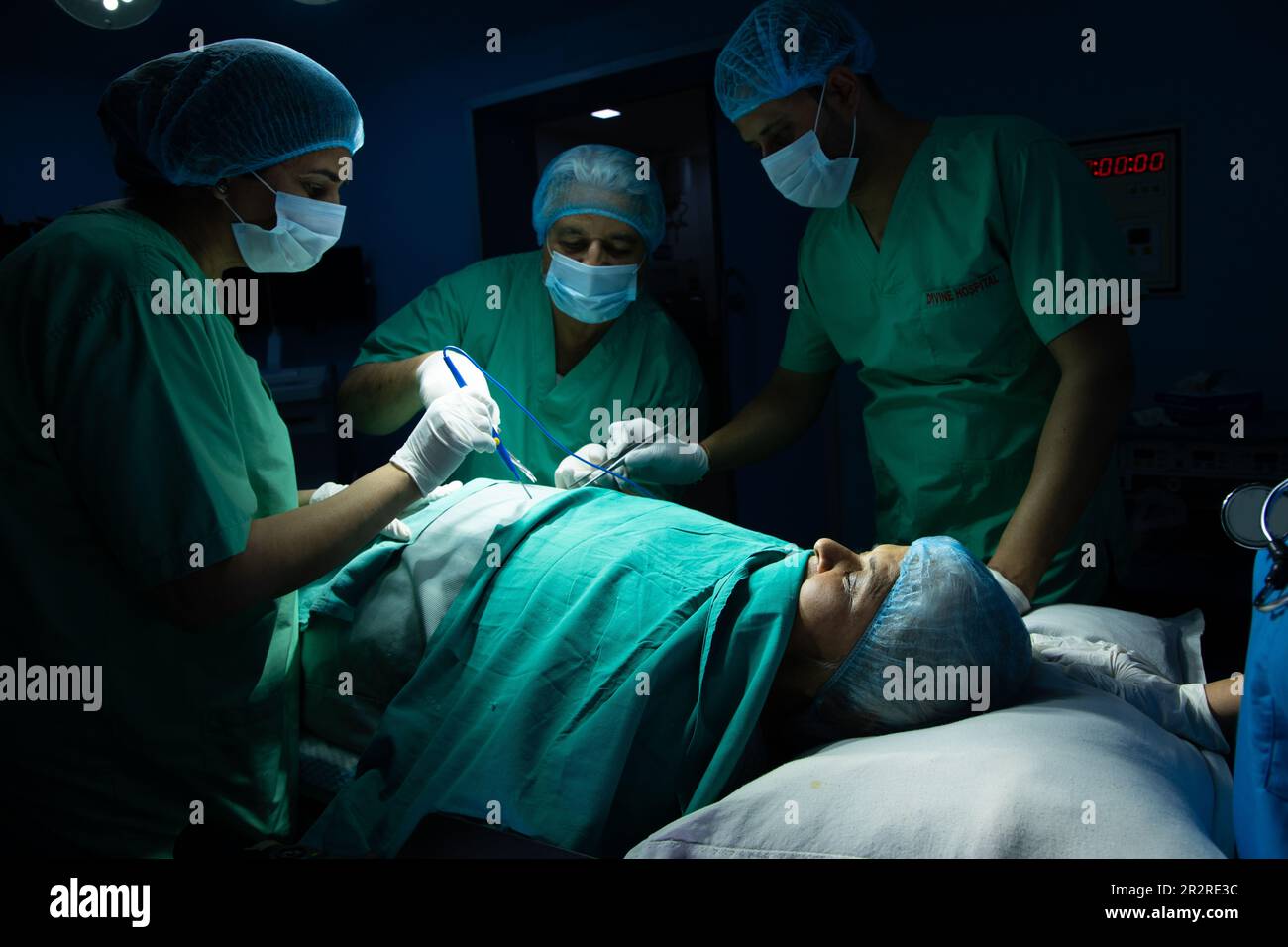 ndian surgeons medical team performing surgery in operation theater at ...