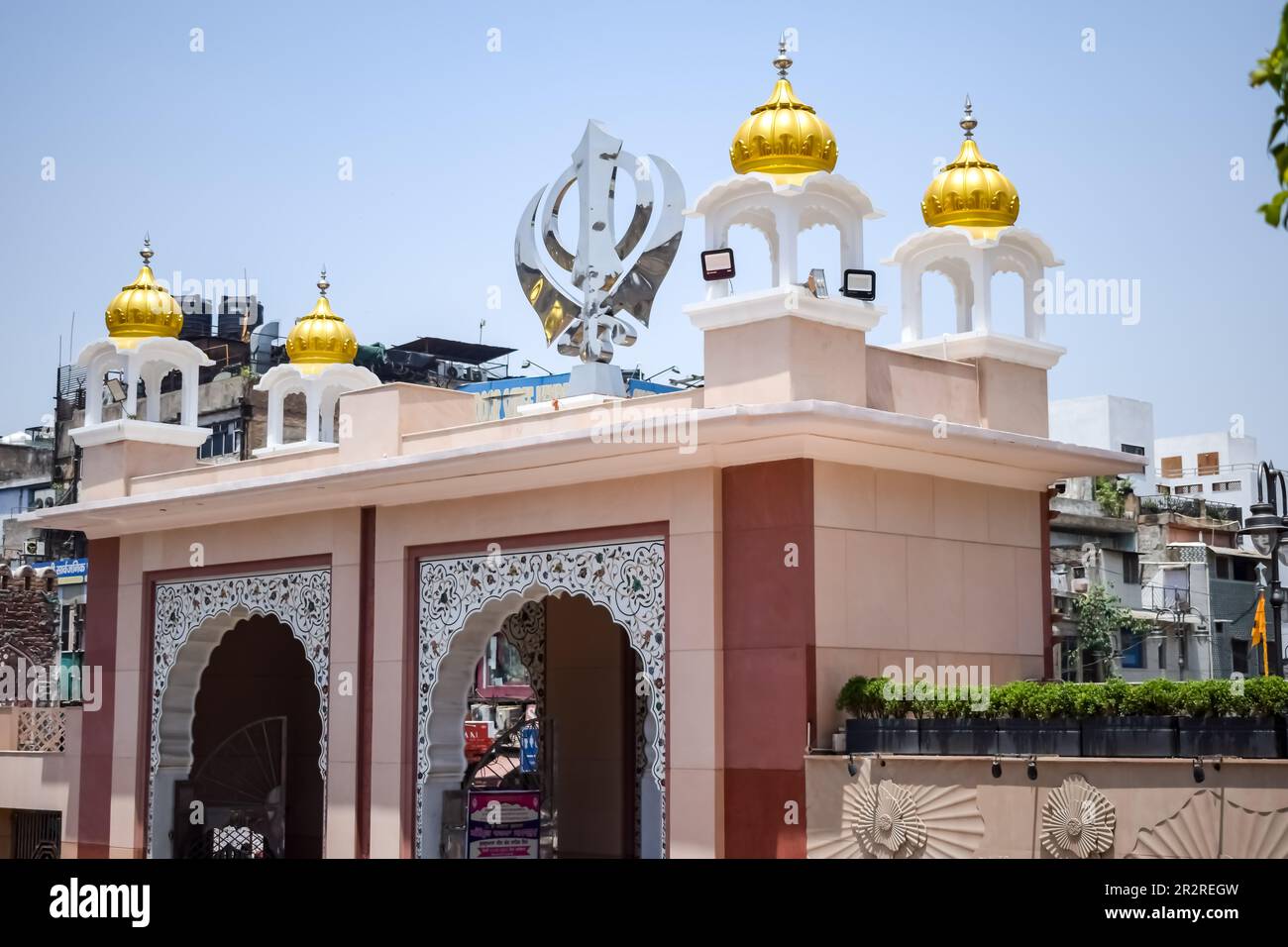 Khanda Sikh holy religious symbol at gurudwara entrance with bright ...