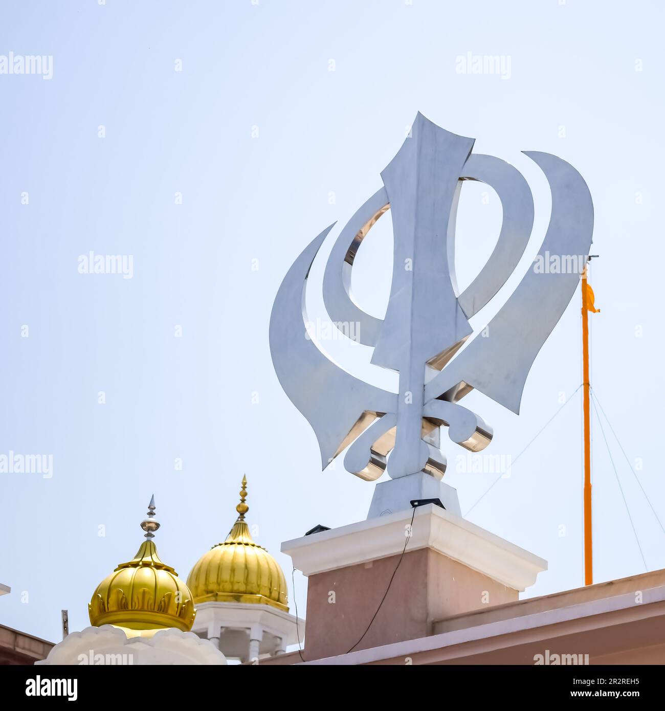 Khanda Sikh holy religious symbol at gurudwara entrance with bright ...