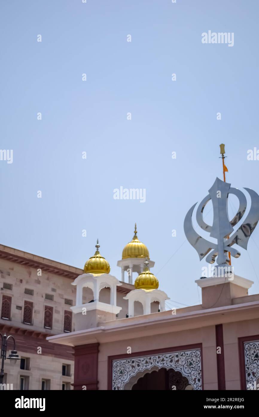 Khanda Sikh holy religious symbol at gurudwara entrance with bright ...