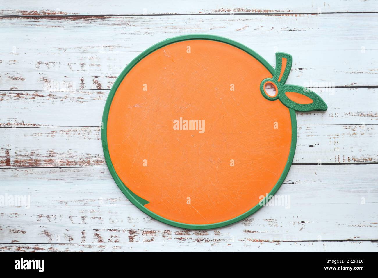 plastic chopping board on table top down Stock Photo - Alamy