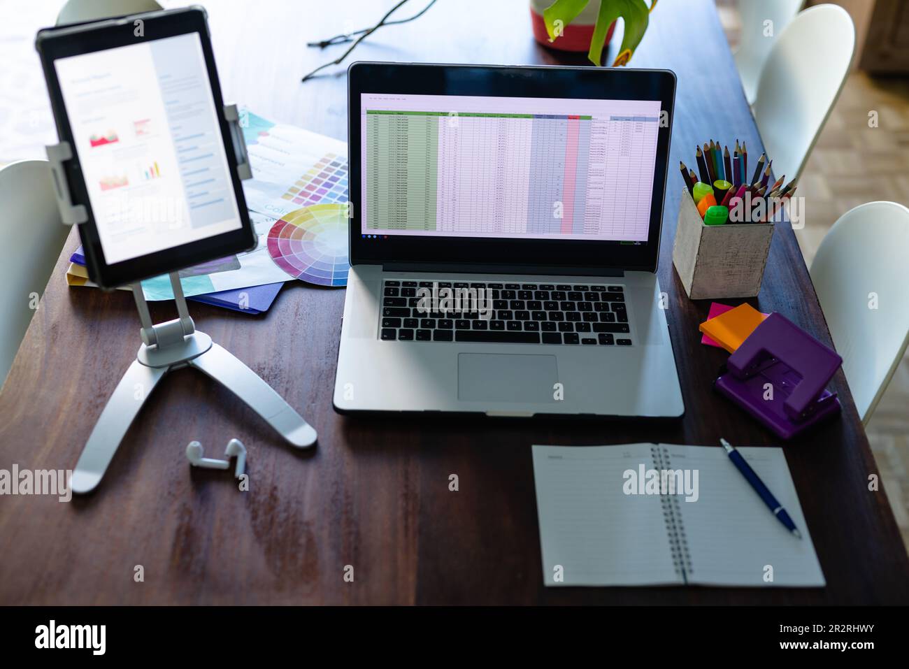 Notepad, laptop and tablet with spreadsheet and document on screen, on ...