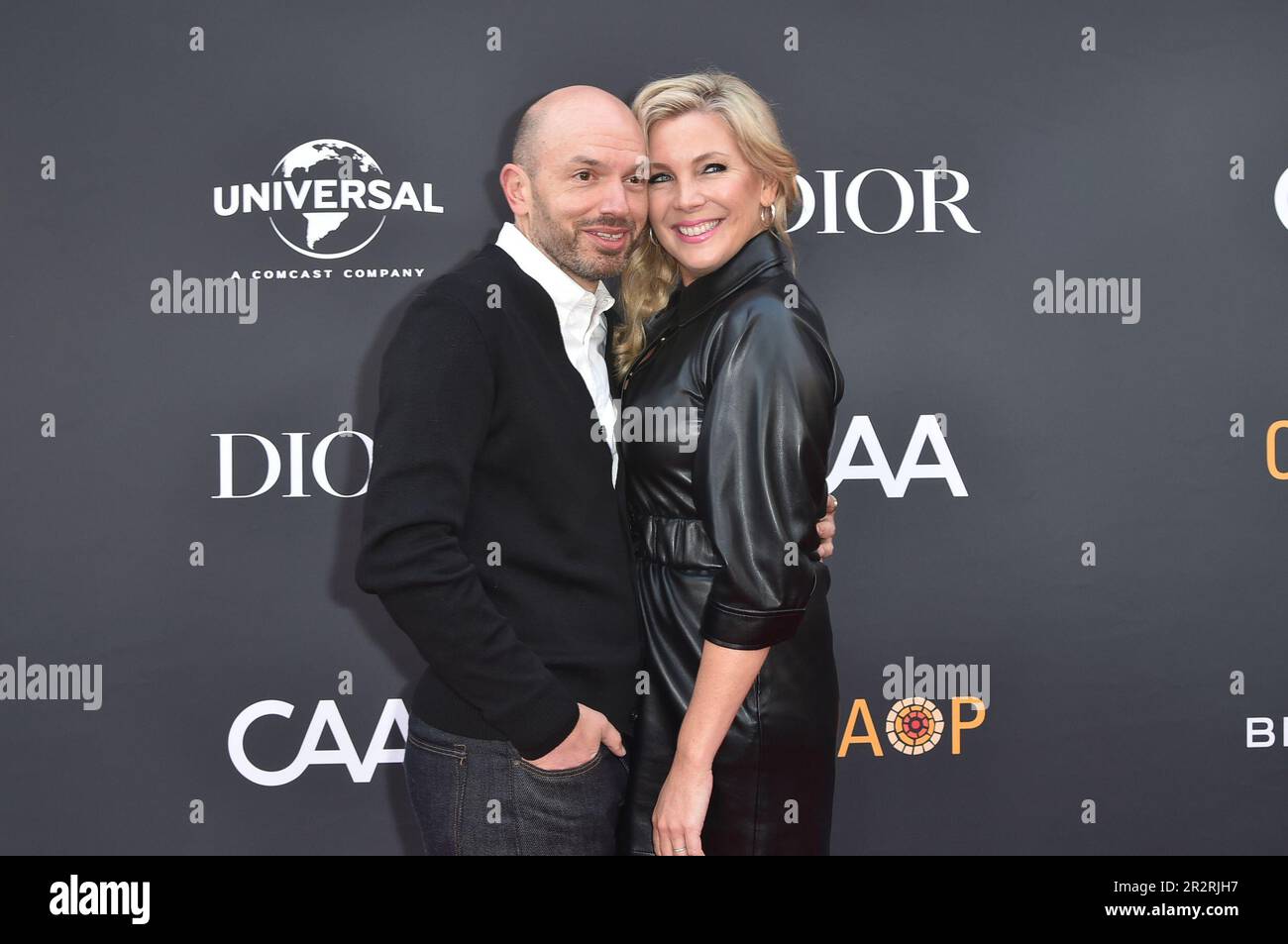 Paul Scheer, left, and June Diane Raphael arrive at the Africa Outreach ...