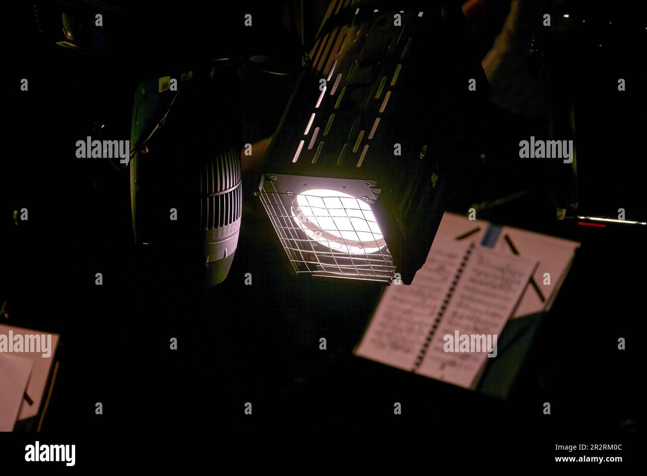 Image of a theatrical spotlight shining on the stage in the theater ...