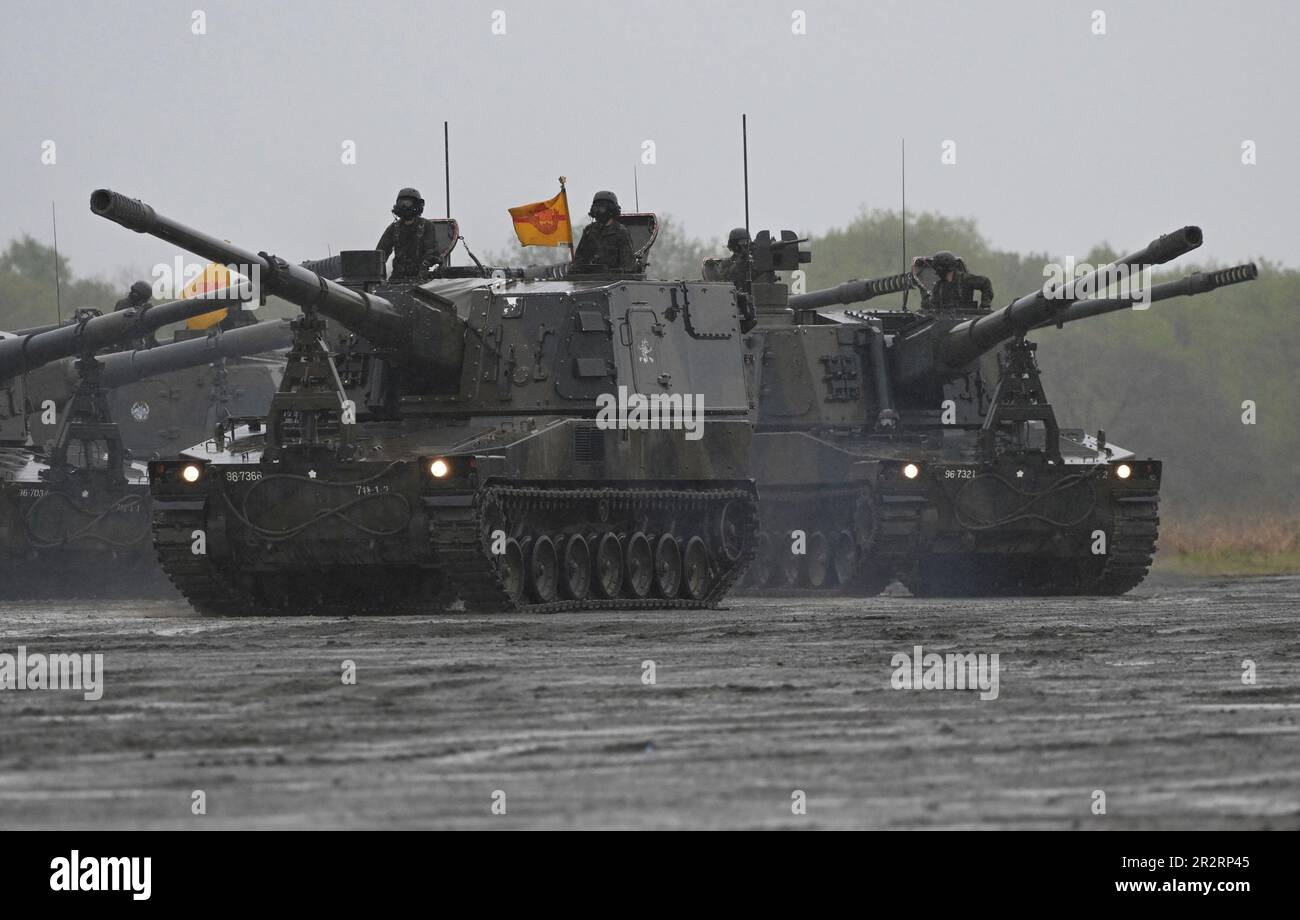 The Type 99 155 mm self-propelled howitzer are pictured during the ...