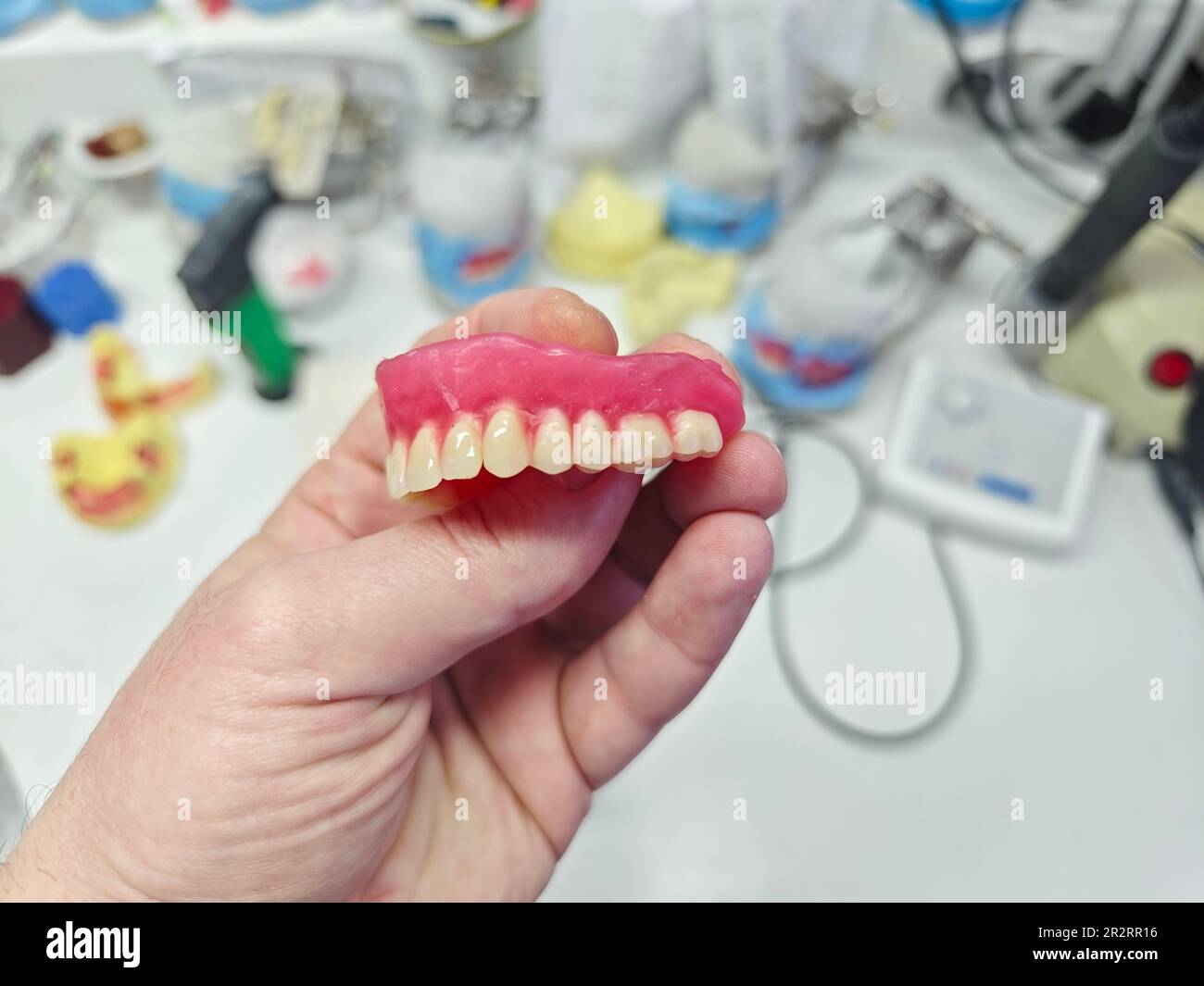 Wax dentures model table of dental technician workplace Stock Photo - Alamy