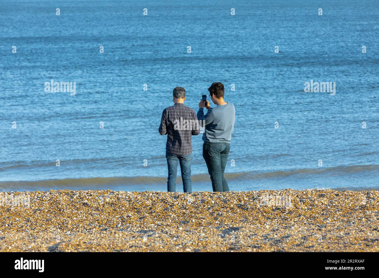 Two young men taking hi-res stock photography and images - Alamy