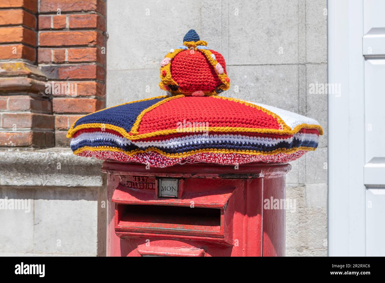 A woolen crown on a post box to celebrate the coronation of King ...