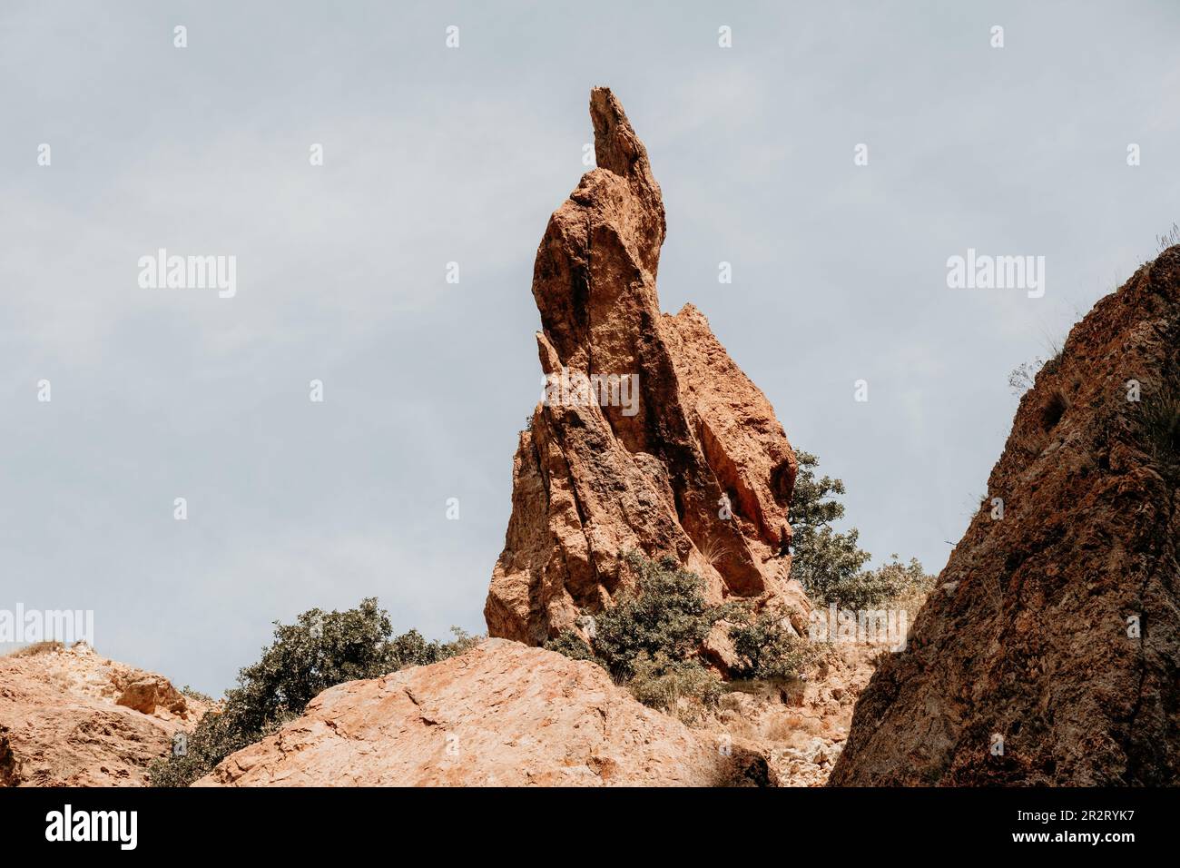 A close up of rocks that look like the beak of a bird or a sharp nose ...