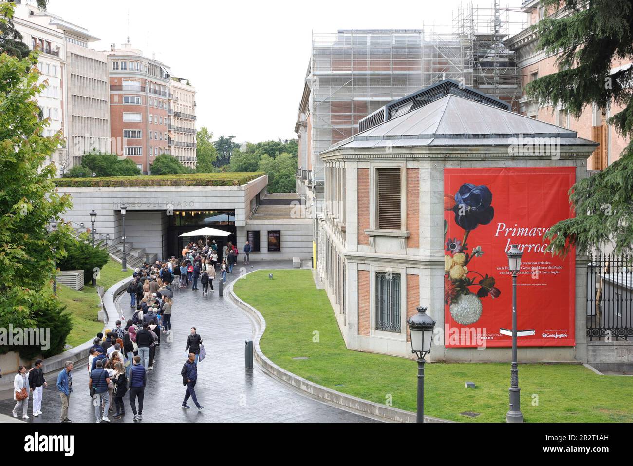 Several people wait to enter the Museo Nacional del Prado, which has ...