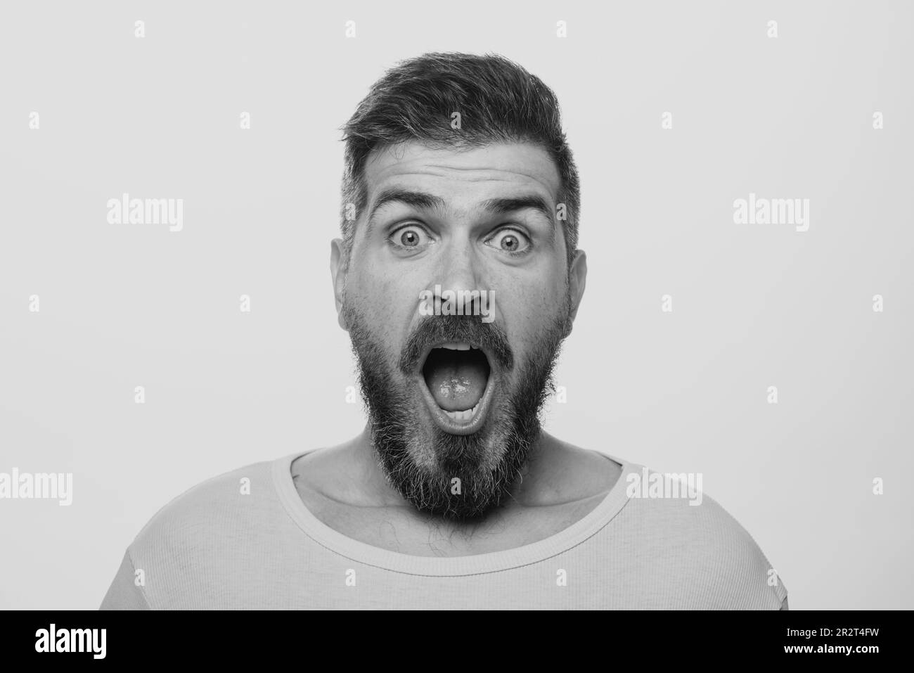 Shocked bearded man with surprise expression, wow amazed excited face ...