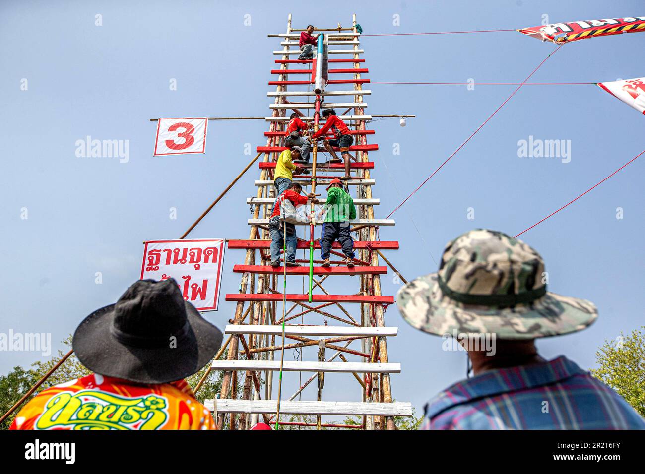 Yasothon, Thailand. 21st May, 2023. People install a bamboo rocket in ...