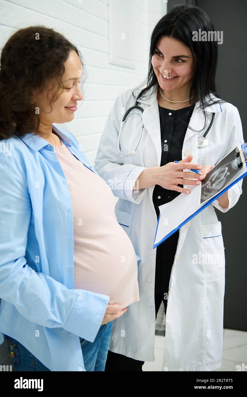 Pregnant woman visit gynecologist obstetrician doctor at maternity ...