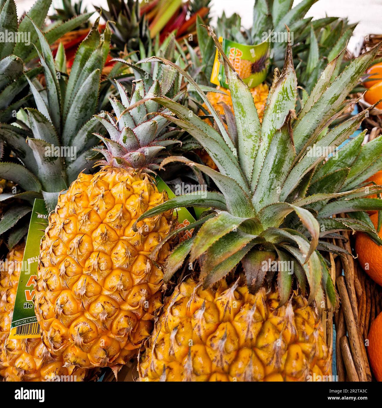 Pineapples on display in an open air market, Bron, France Stock Photo ...