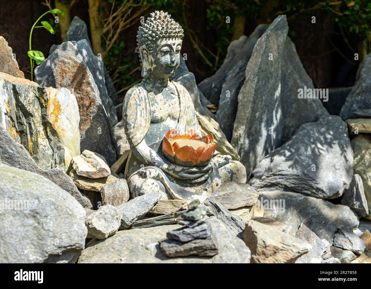 Waterfall stone statue buddha waterfall hi-res stock photography and ...