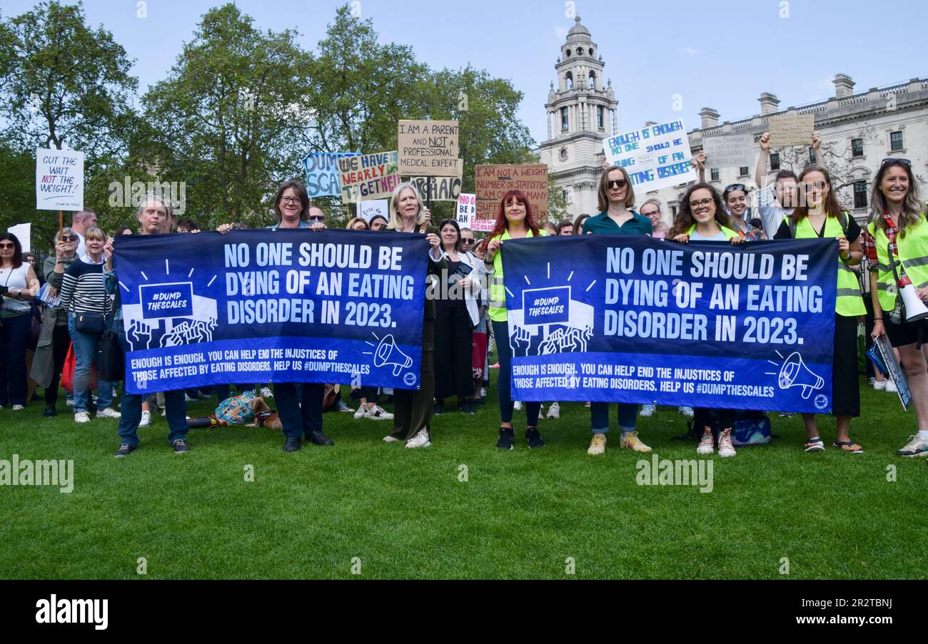 London, UK. 20th May, 2023. Protesters hold banners which state ''No ...