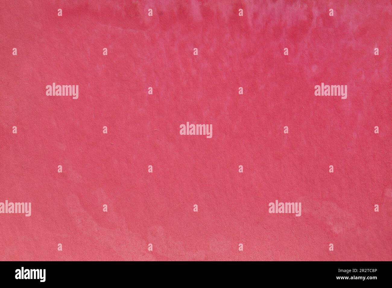 red painted watercolor background on paper texture Stock Photo - Alamy