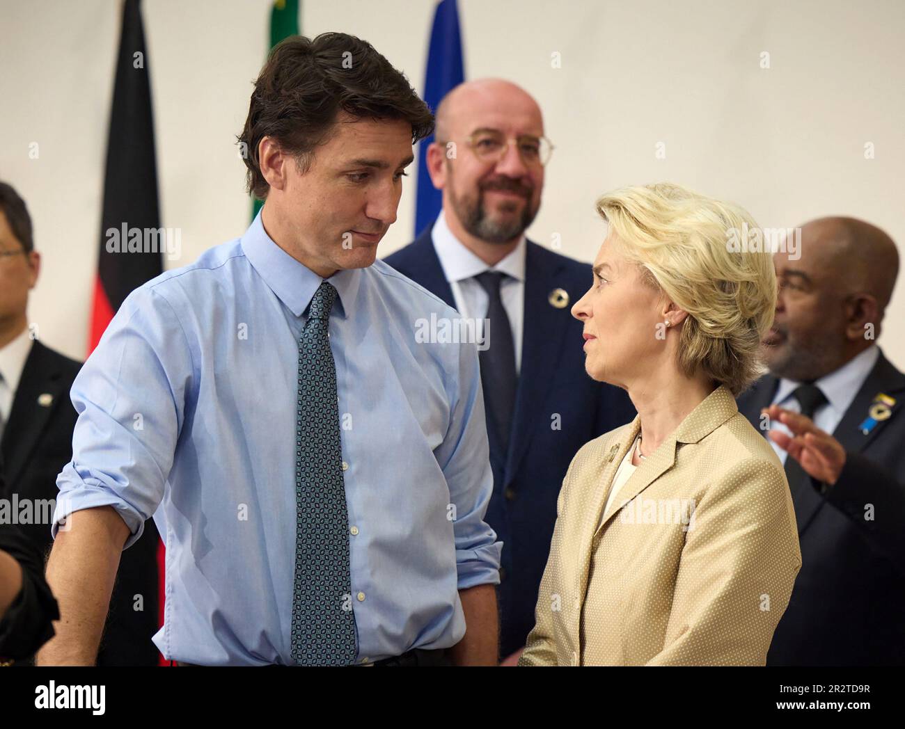 Canadian Prime Minister Justin Trudeau (L) speaks with European ...