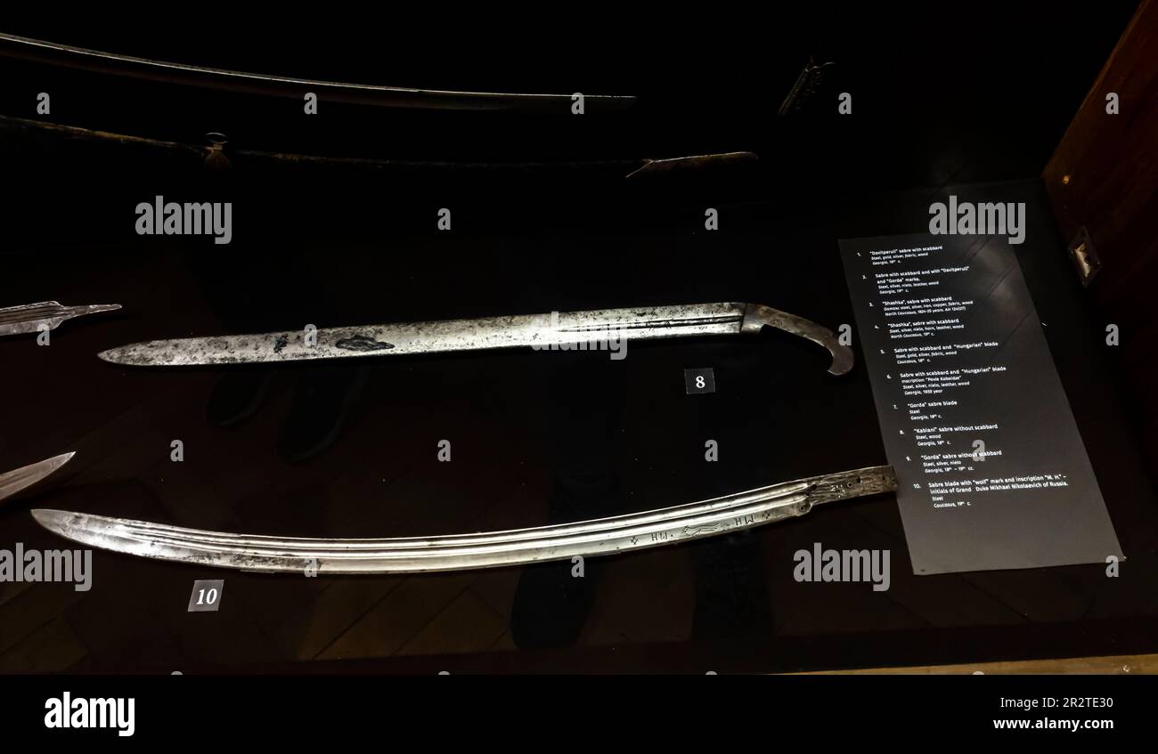 Kabiani sabre, 18th c.(on top.) Sabre blade with "wolf" mark and M.H ...