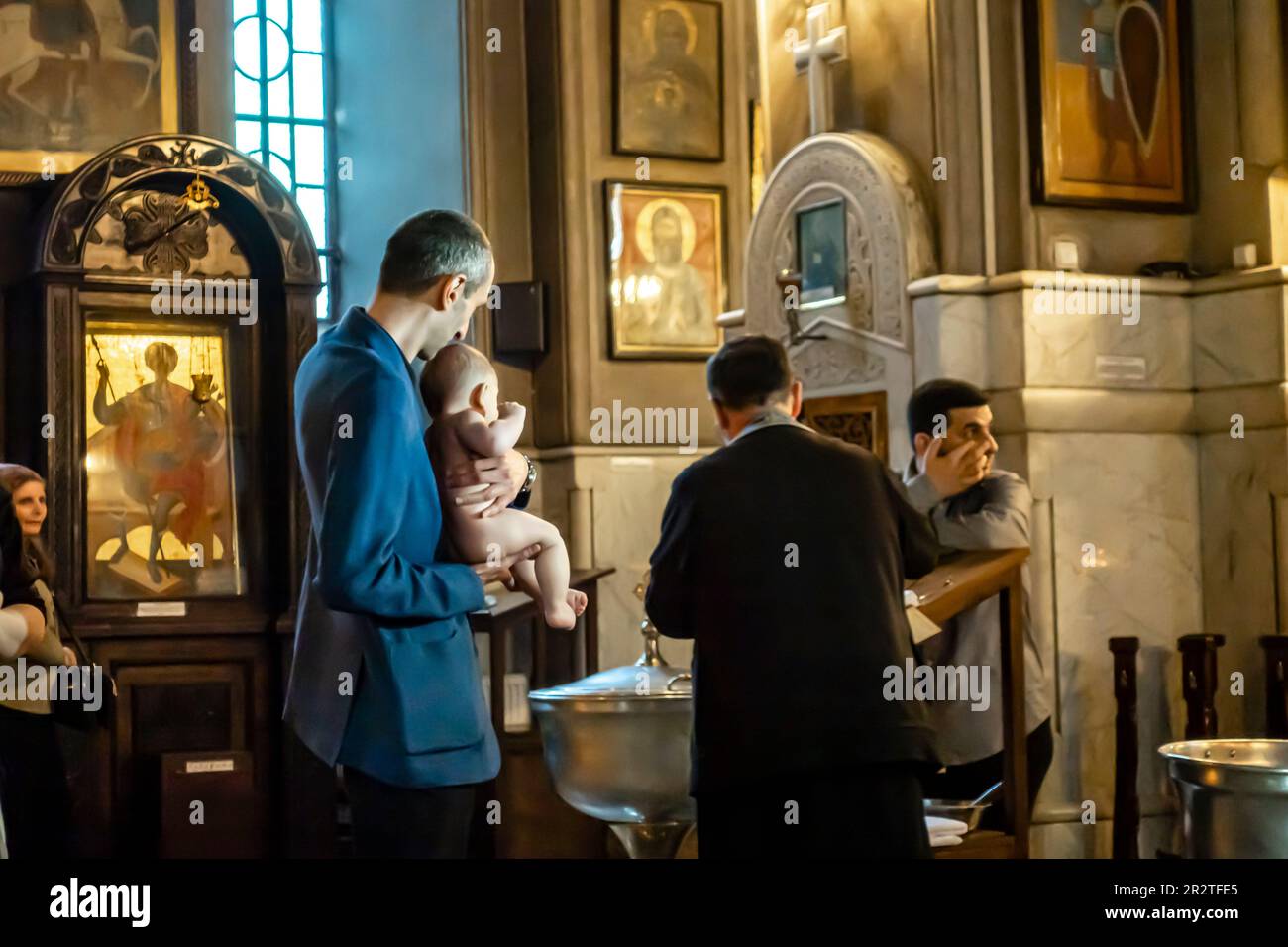Baptising a child hi-res stock photography and images - Alamy