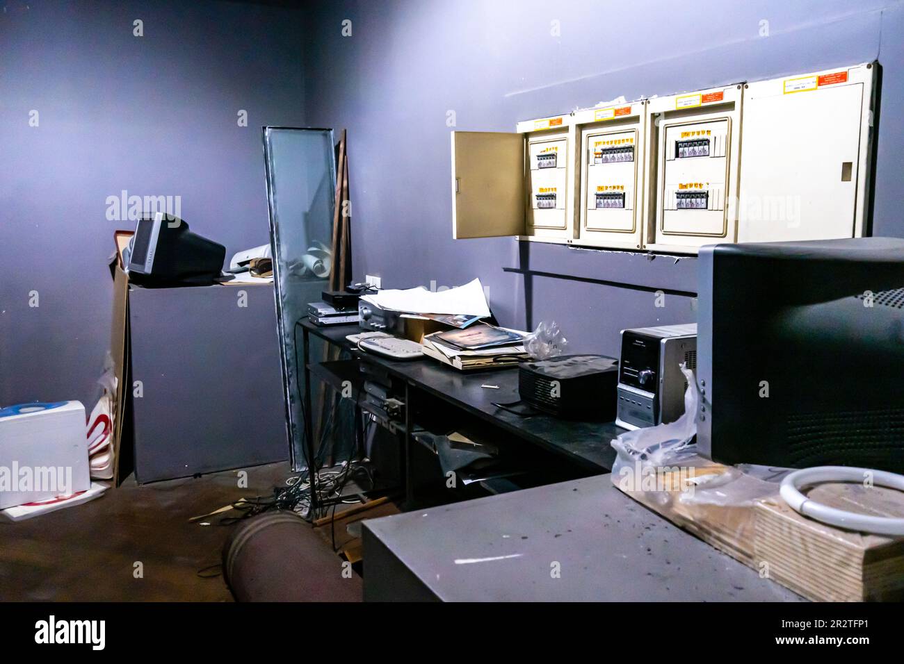 Cluttered messy storage room with open electric shield box hi-res stock ...