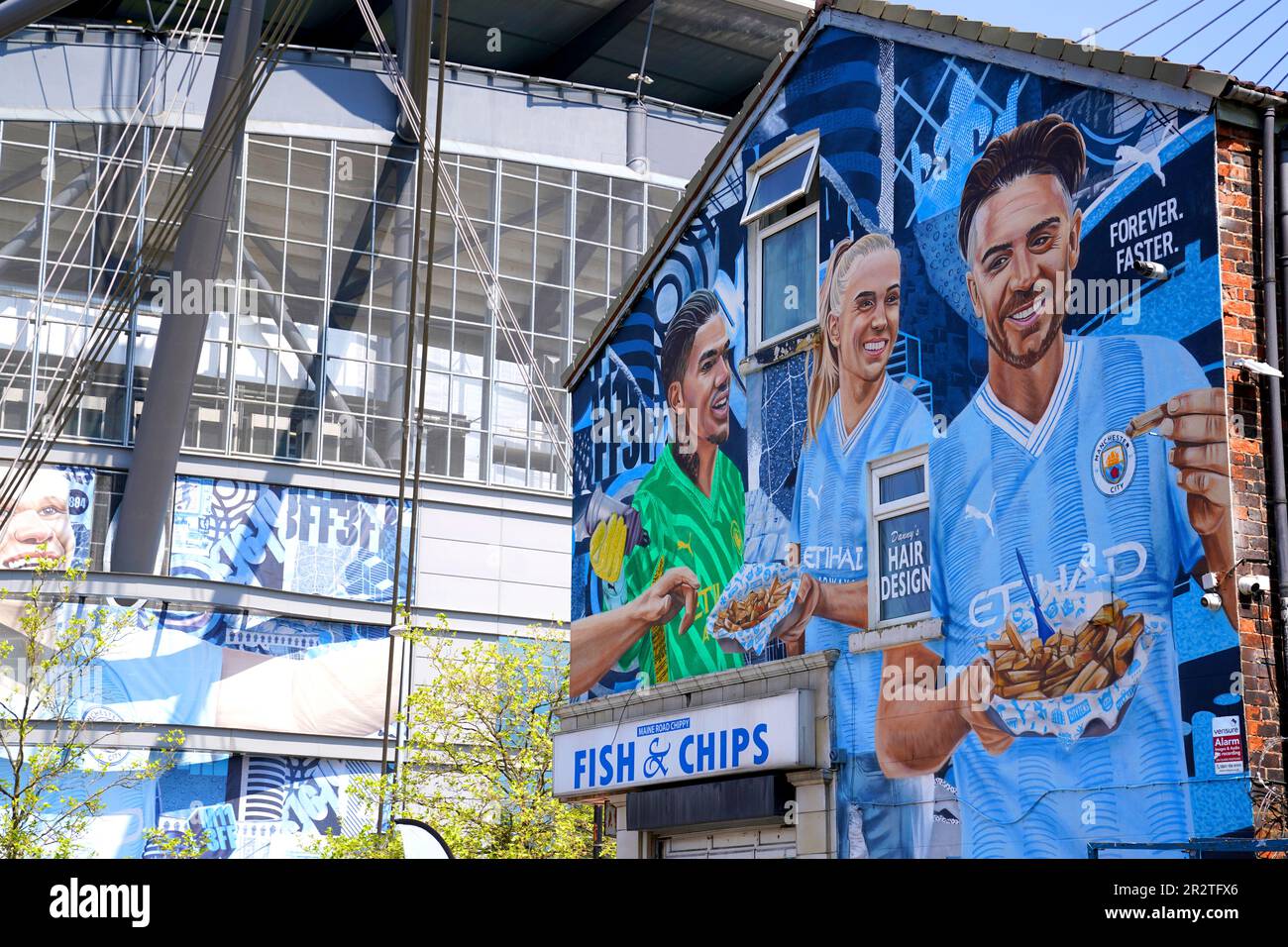 A Manchester City mural on the side of Maine Road Chippy next to the ...