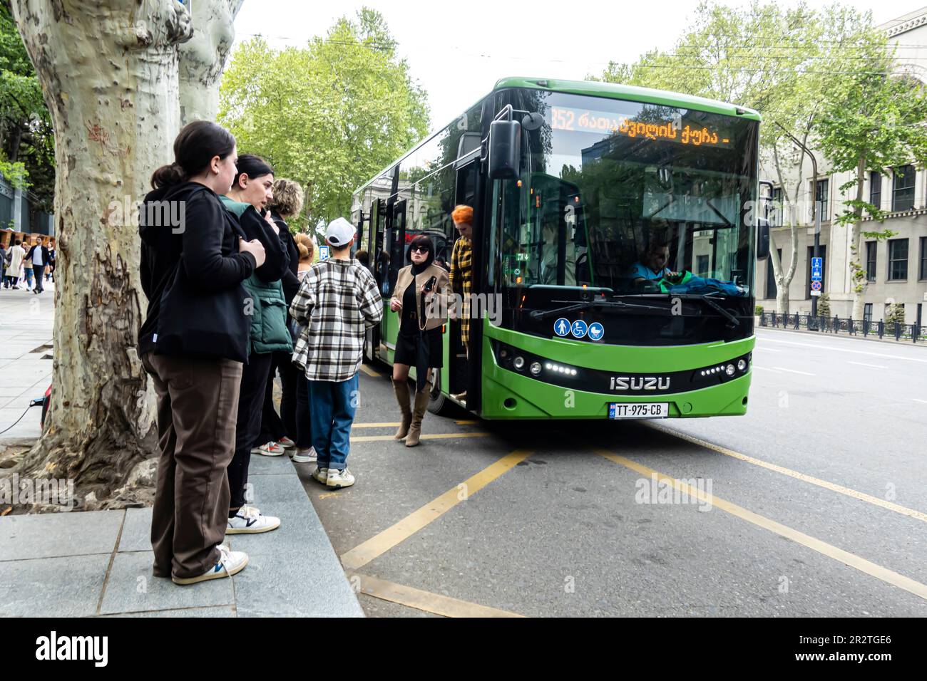 Passengers waiting for a city bus, Rustaveli ave Tbilisi Georgia Stock ...