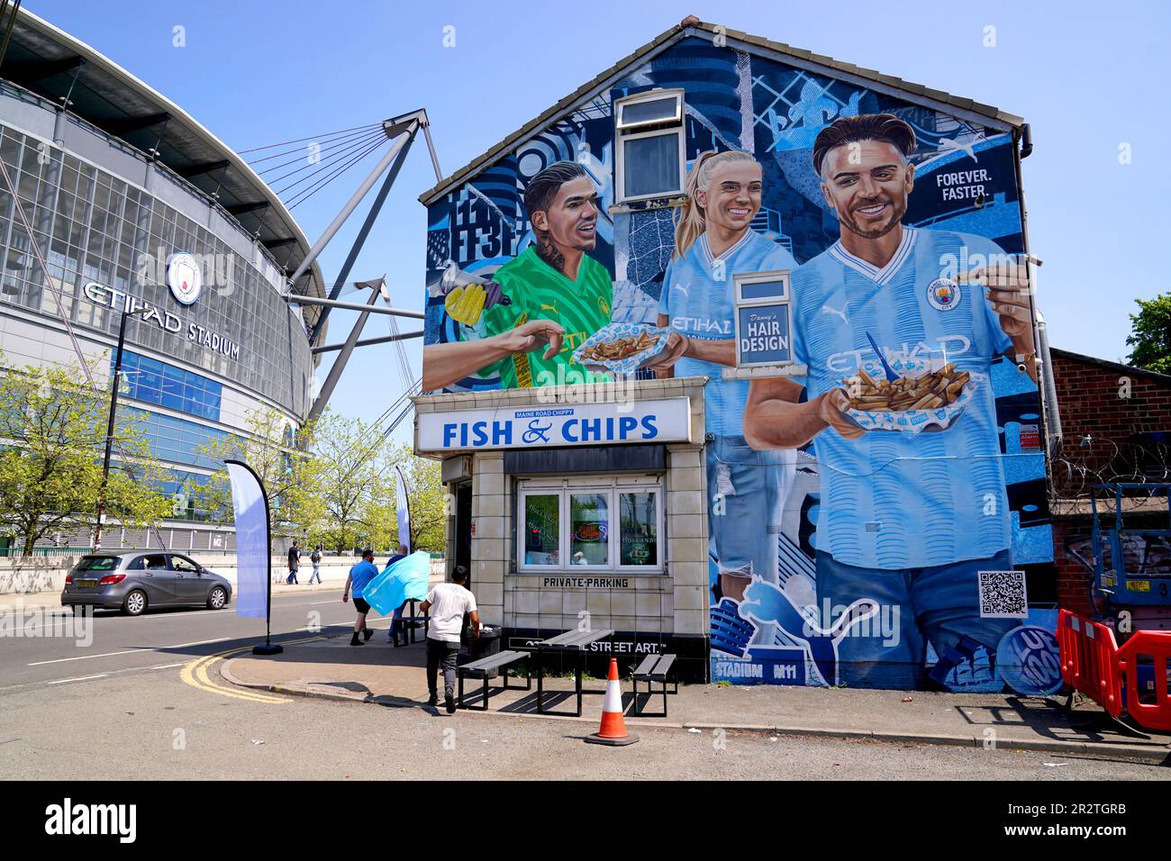 A Manchester City mural on the side of Maine Road Chippy next to the ...