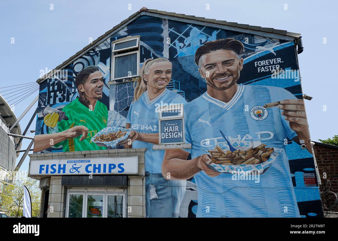 Manchester, UK. 21st May, 2023. The mural on the side of the Maine Road ...