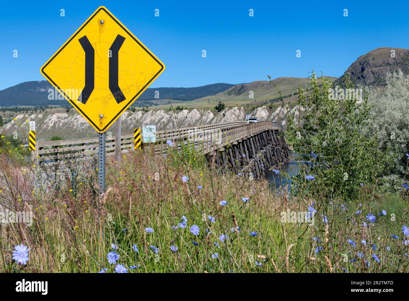 Full length view of wooden Pritchard Bridge (stringer bridge) across ...