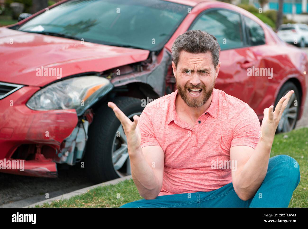 Upset driver man in front of automobile crash car collision accident ...