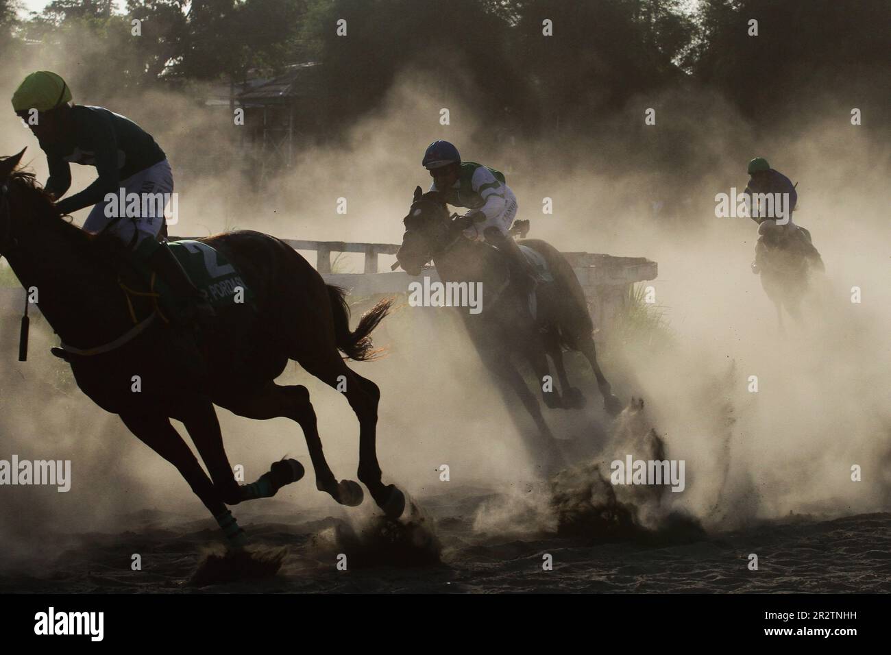 Bantul, Yogyakarta, Indonesia. 21st May, 2023. Jockey spurring his ...