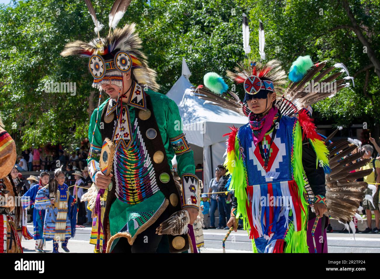 Calgary, AB, Canada-August 2022; Close up of two man in colorful outfit ...