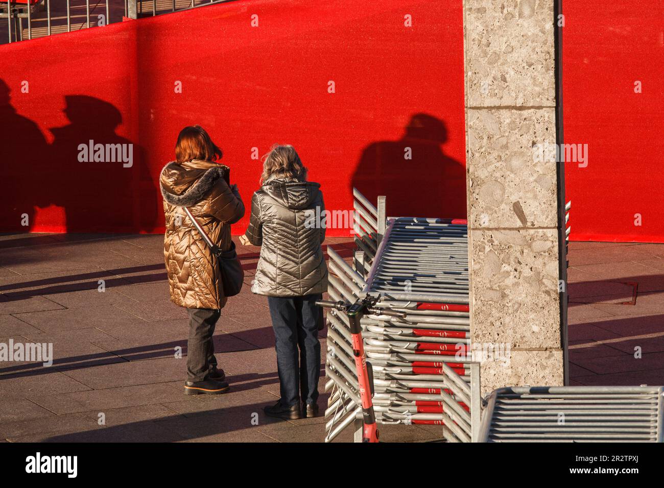 people passing a red grandstand set up for the carnival processions in ...