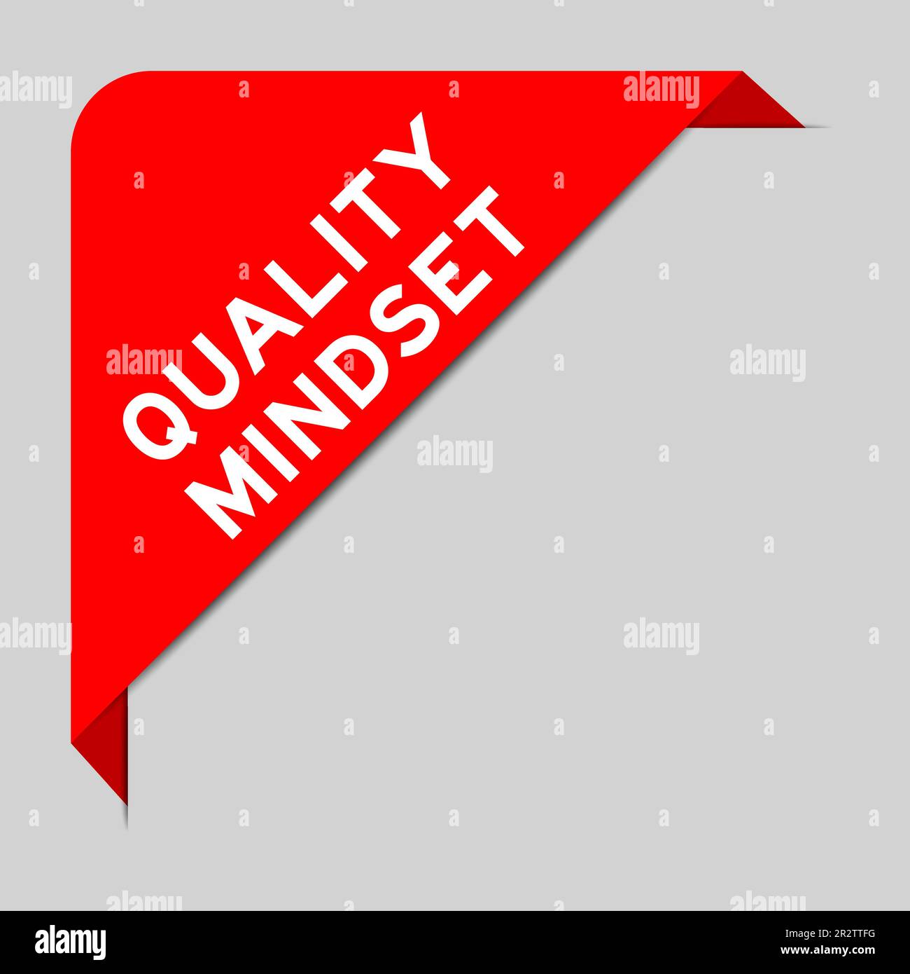 Red color of corner label banner with word quality mindset on gray ...