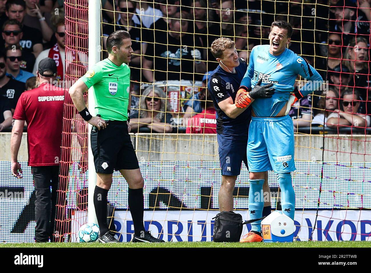 DEVENTER - Pain at FC Volendam goalkeeper Filip Stankovic during the ...