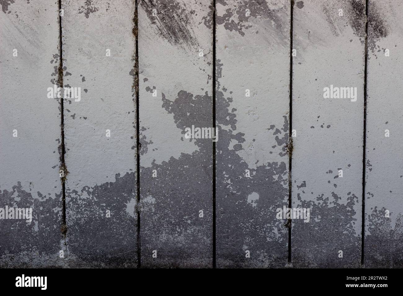 Architectural background with detail of a concrete partially shaded ...