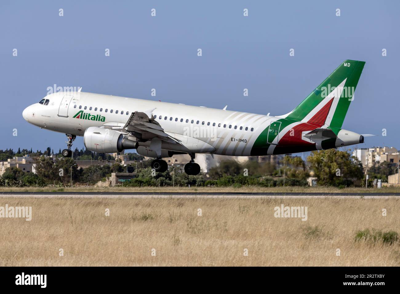 ITA Airways in Alitalia livery Airbus A319-112 (REG: EI-IMD) arriving ...
