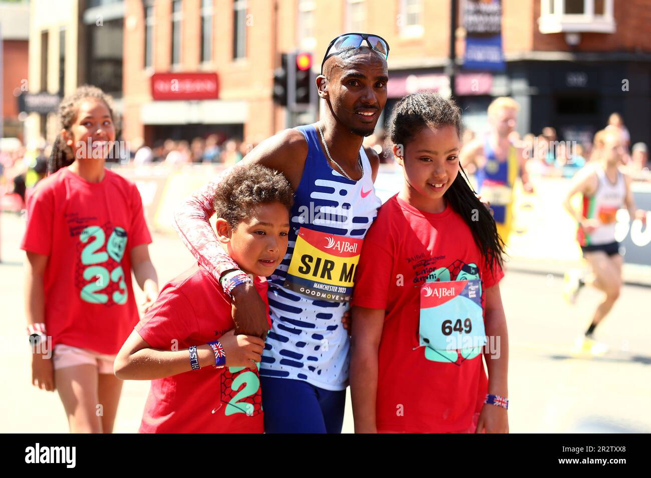 Sir Mo Farah (second right) with his children, Amani (right) and ...