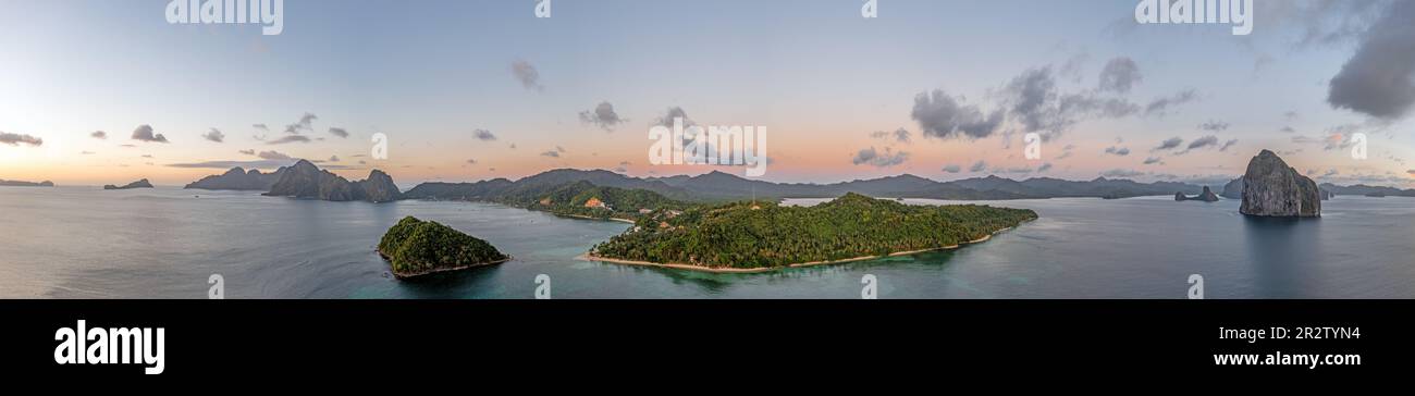 Drone panorama of the paradisiacal Maremegmeg beach near El Nido on the ...