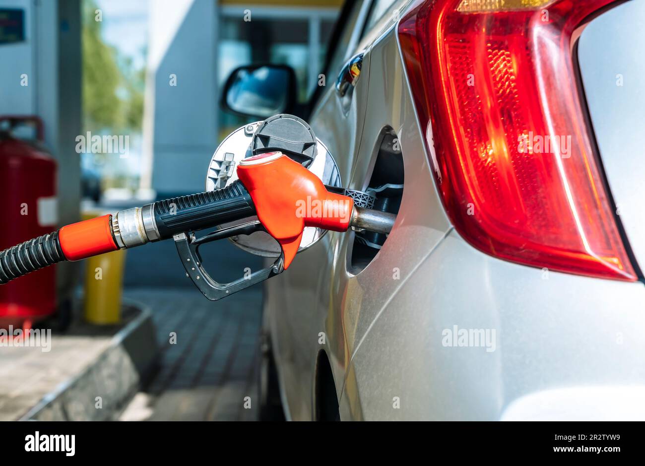 Gas station. Pistols with gasoline and diesel fuel at a car gas station ...