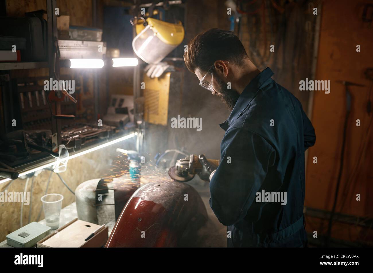 Man polishing helmet hi-res stock photography and images - Alamy